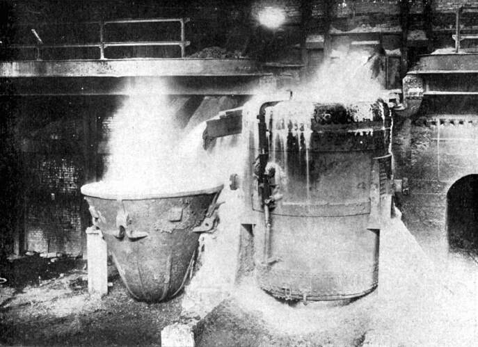 TAPPING AN OPEN-HEARTH FURNACE IN A STEEL MILL